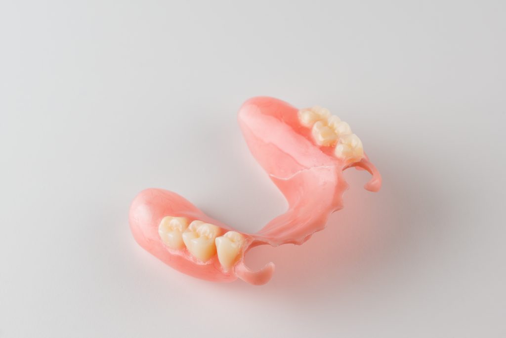 Houston Dentist Uses A Partial Denture To Address Major Tooth Loss ...